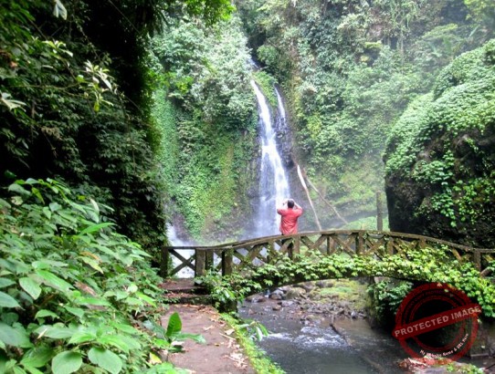 Sam in front of Kali Waterfall - Tonga Time